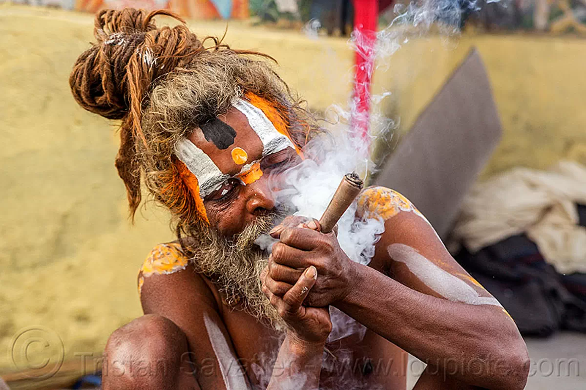 baba smoking chillum of weed, cannabis, ganja, nepal