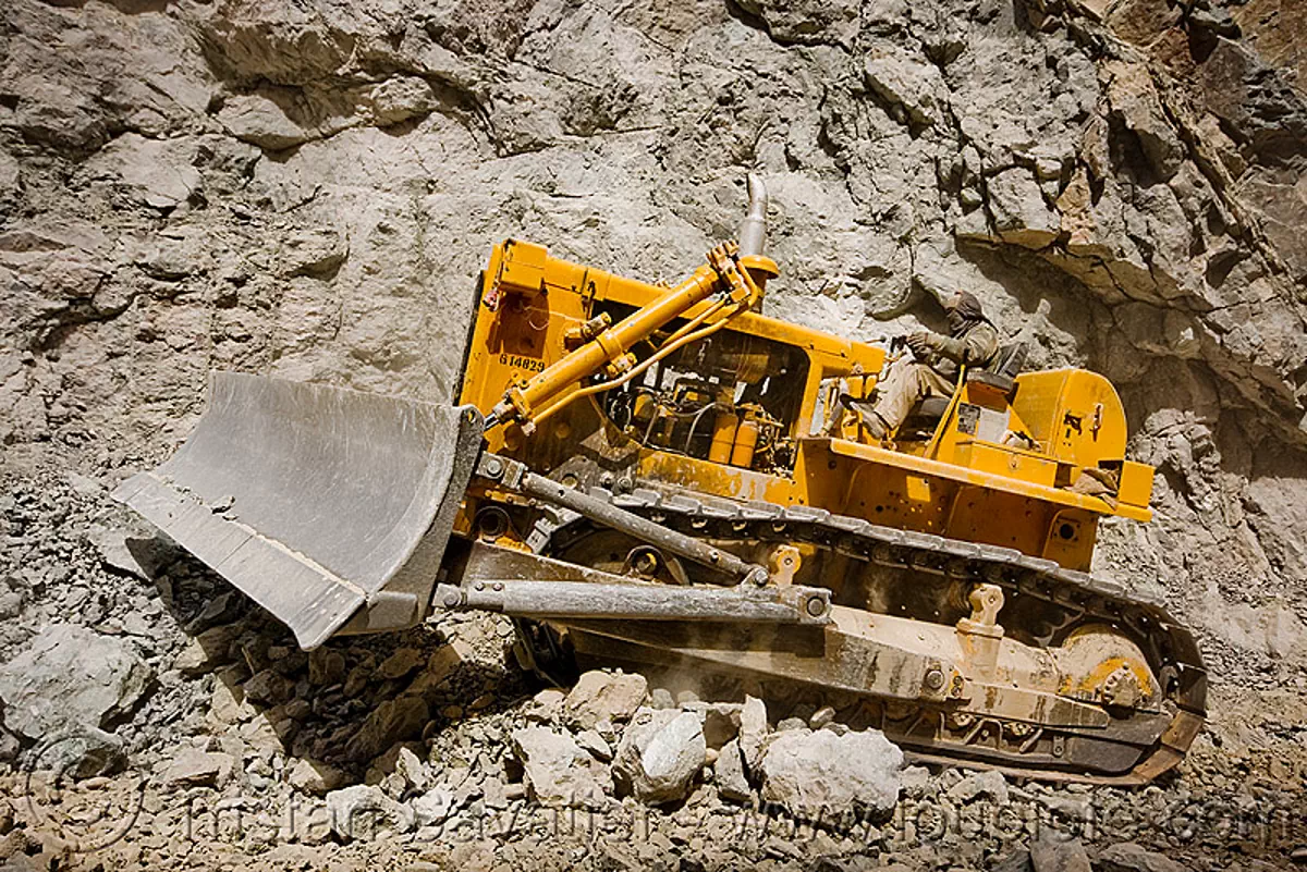 bulldozer clearing boulders, road construction, ladakh, india ...
