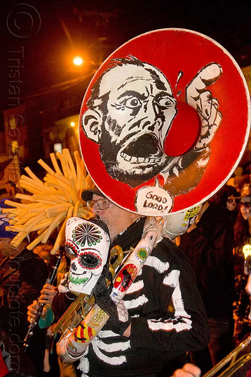 burning band tuba player in skeleton costume