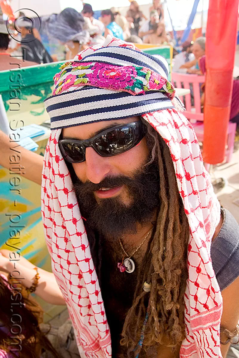 burning man, burner with dreadlocks, arabian keffiyeh, beard