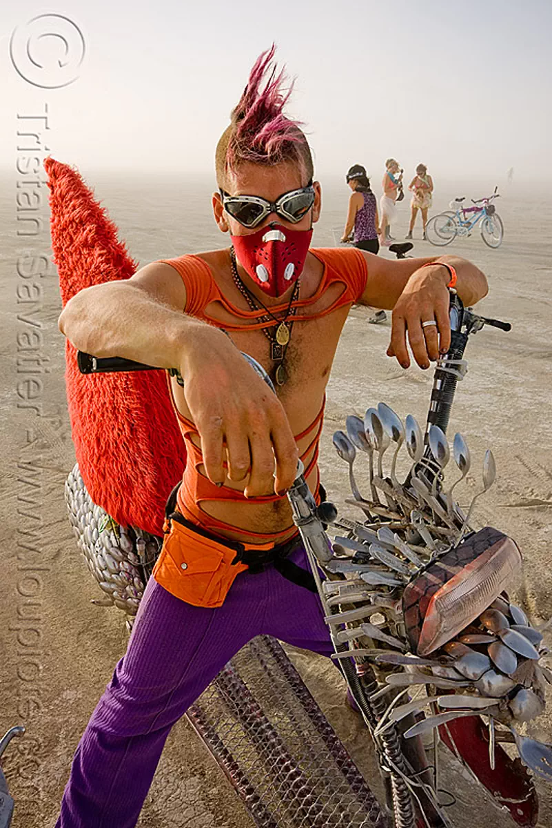 burning man, cool burner with mohawk and spoon fish bike, eric