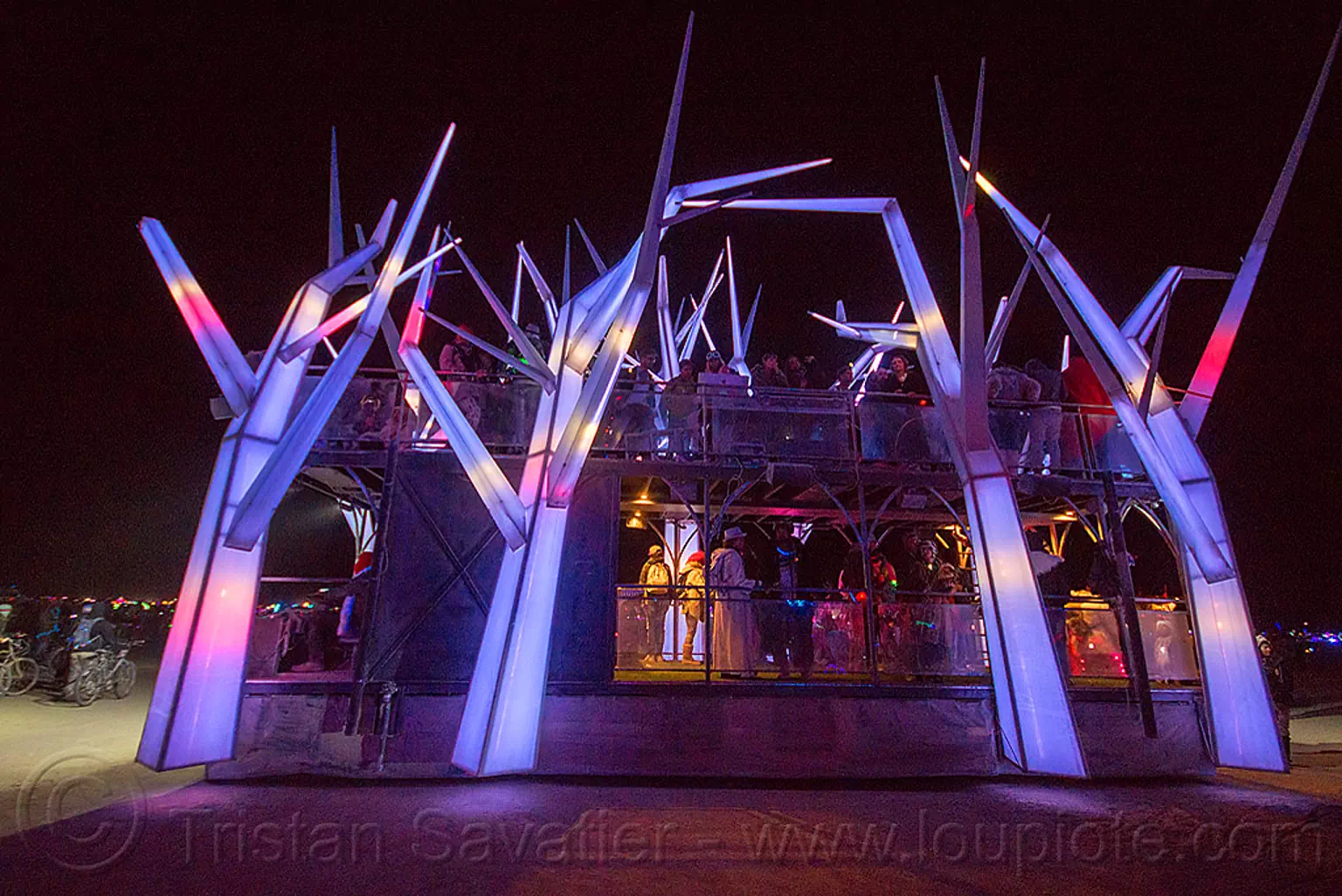 burning man, crystal trees art car at night, foresthouse