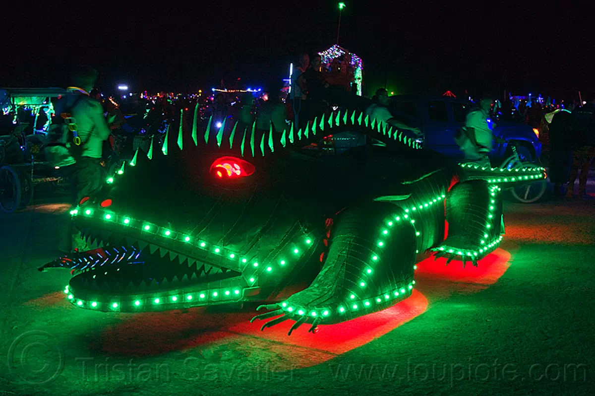burning man, green lizard art car