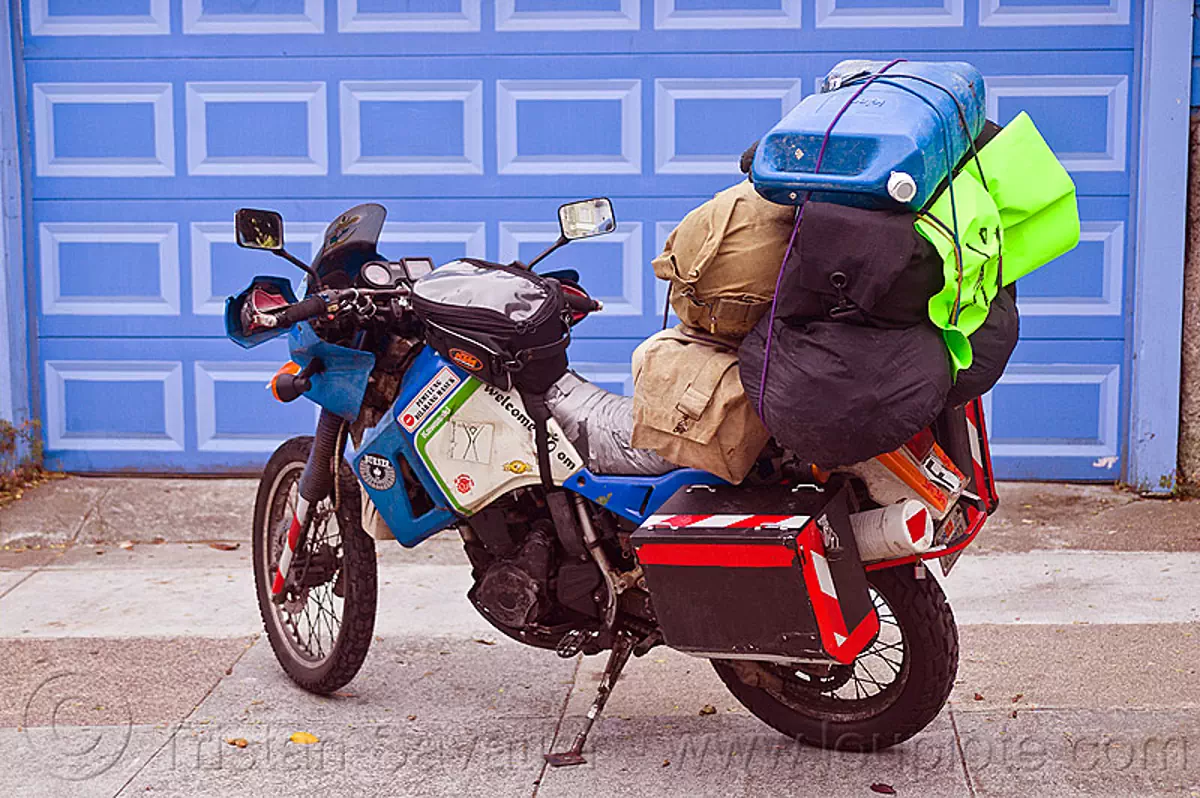 burning man, motorbike loaded with luggage