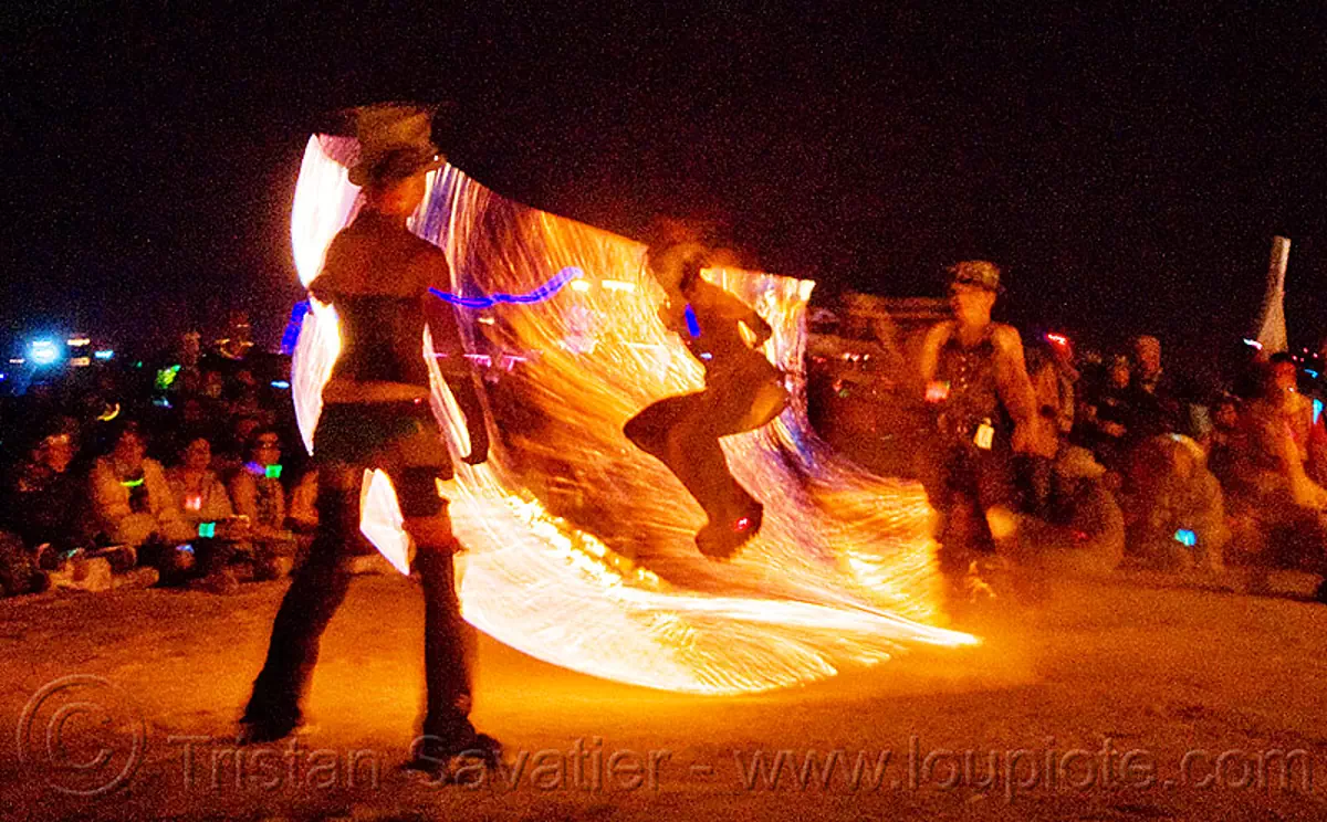 burning man, procession ceremonial flame, fire conclave, fire jumping rope