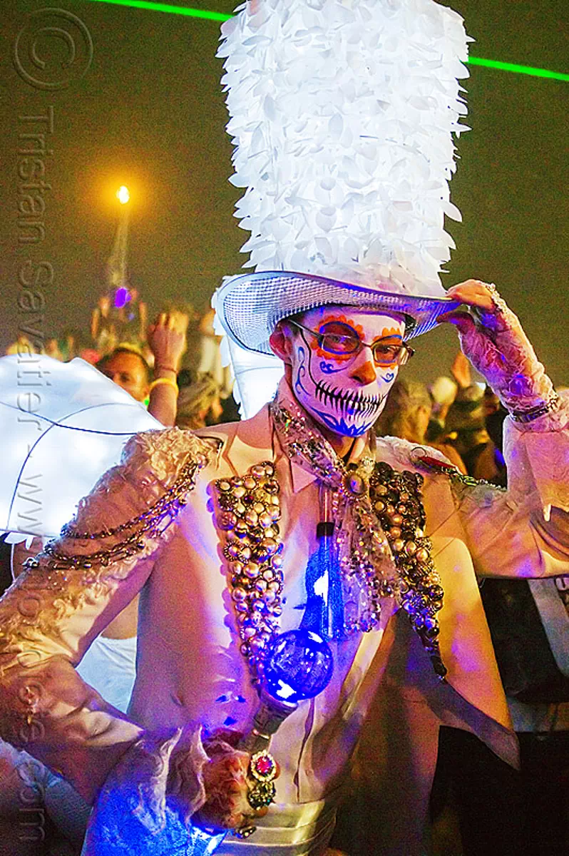 burning man, "rebar" in his trademark dia de los muertos face paint and ...