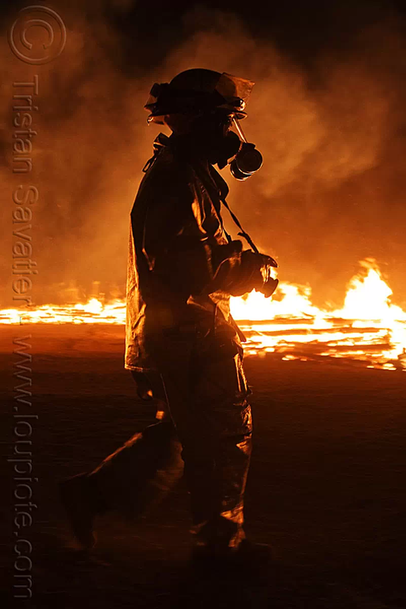 burning man, volunteer firefighter in fire-protection suit