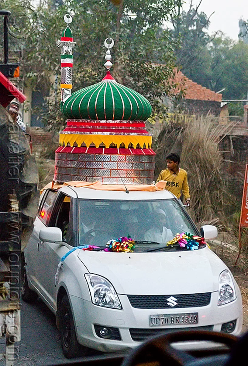 car decorated with mosque dome & minaret on its roof, eid-milad-un-nabi ...