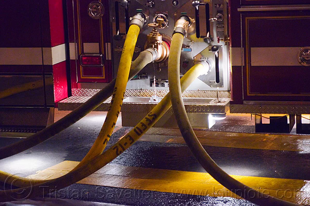 fire hoses on fire engine pump