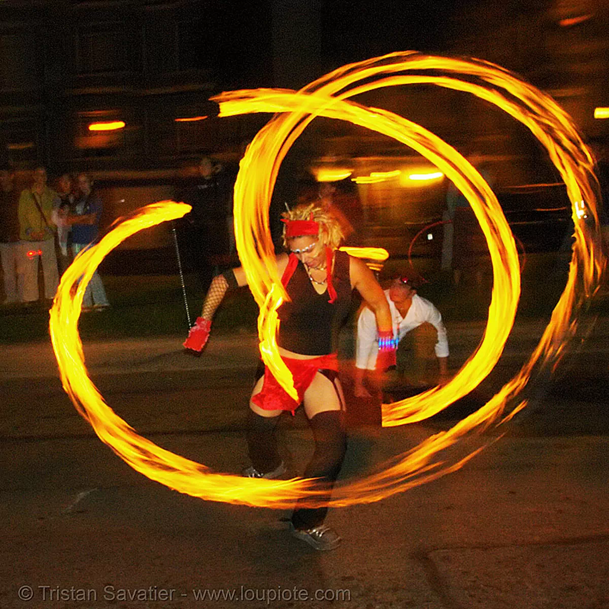 fire spinning at night, san francisco