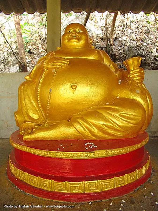 golden budai (fat buddha), tham wat, thailand