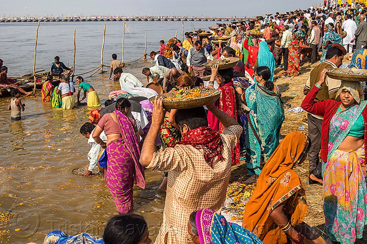 hindu devotees bring clay shiva linga's offerings to the ganges river ...