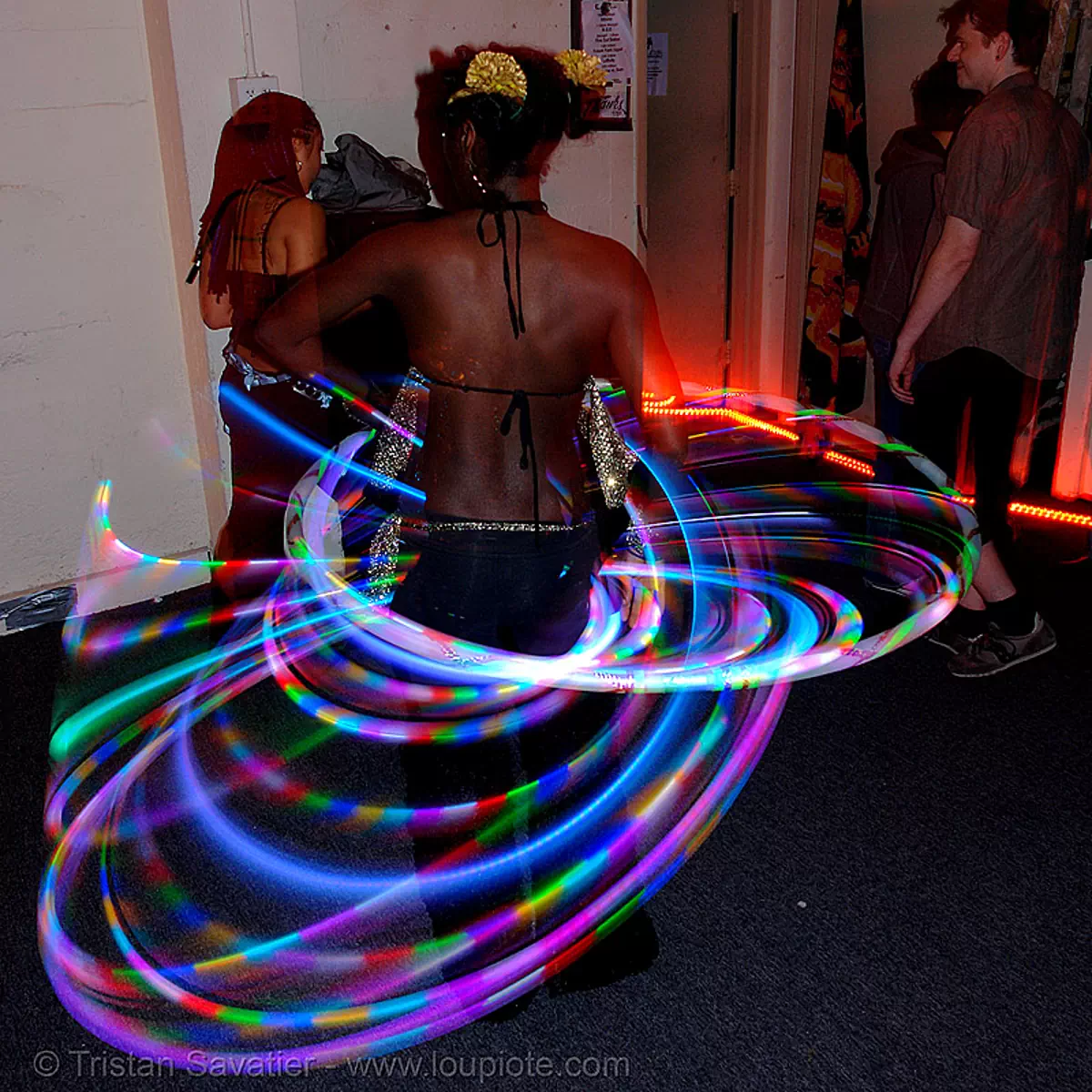 joy spinning a LED hula hoop, san francisco