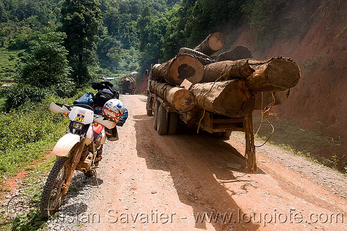 logging truck convoy, honda XR 250, laos
