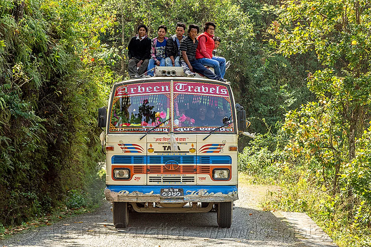 nepali on top of local bus, nepal
