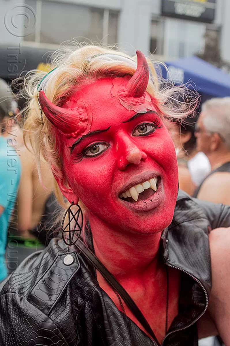 red devil makeup, horns, fangs