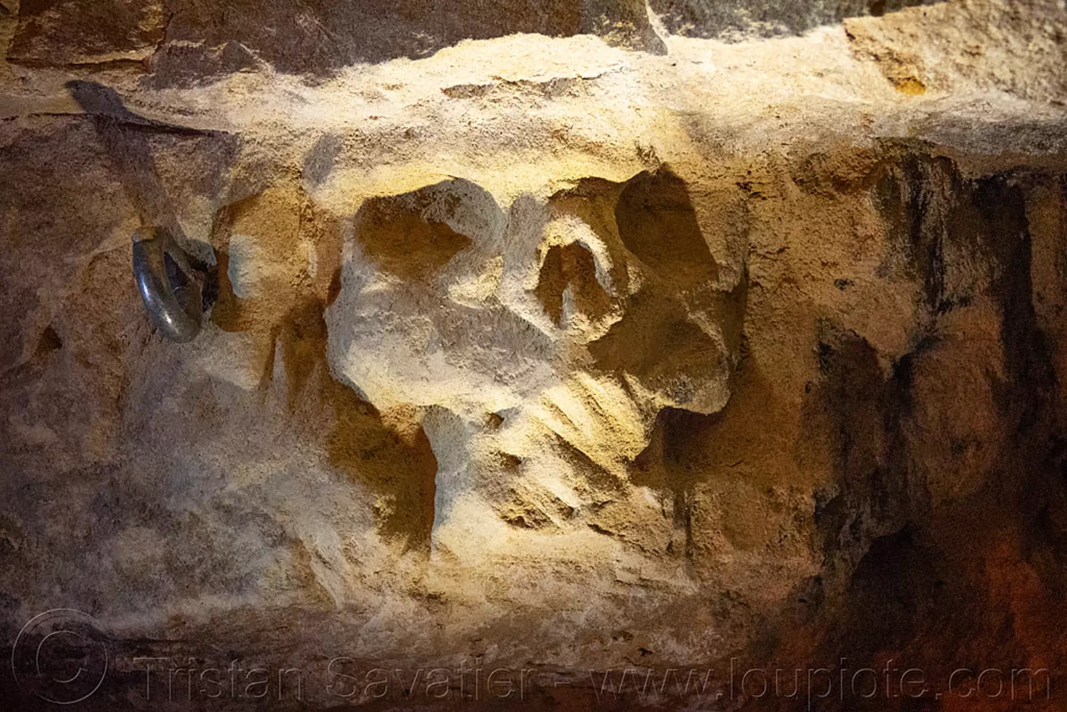 skull sculpture, catacombes de paris, catacombs of paris, off-limit area