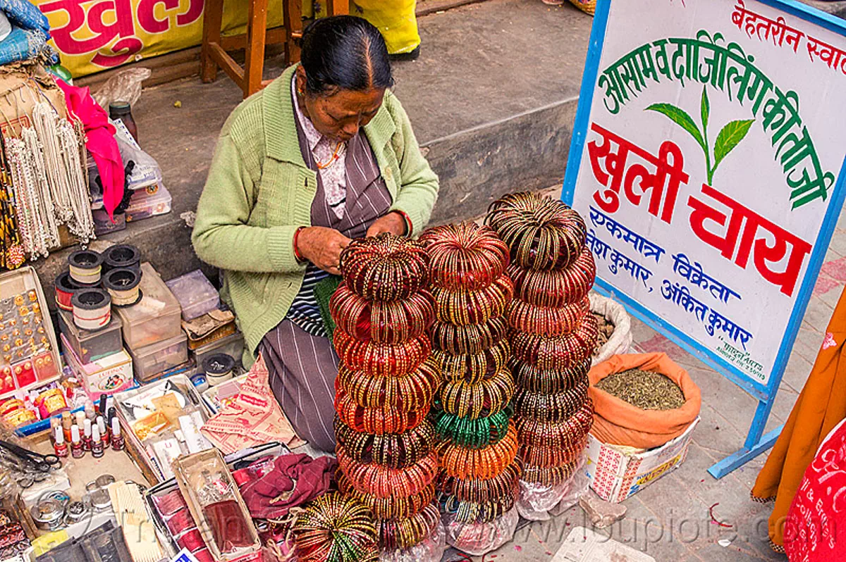 stacks of bracelets in almora street market, india