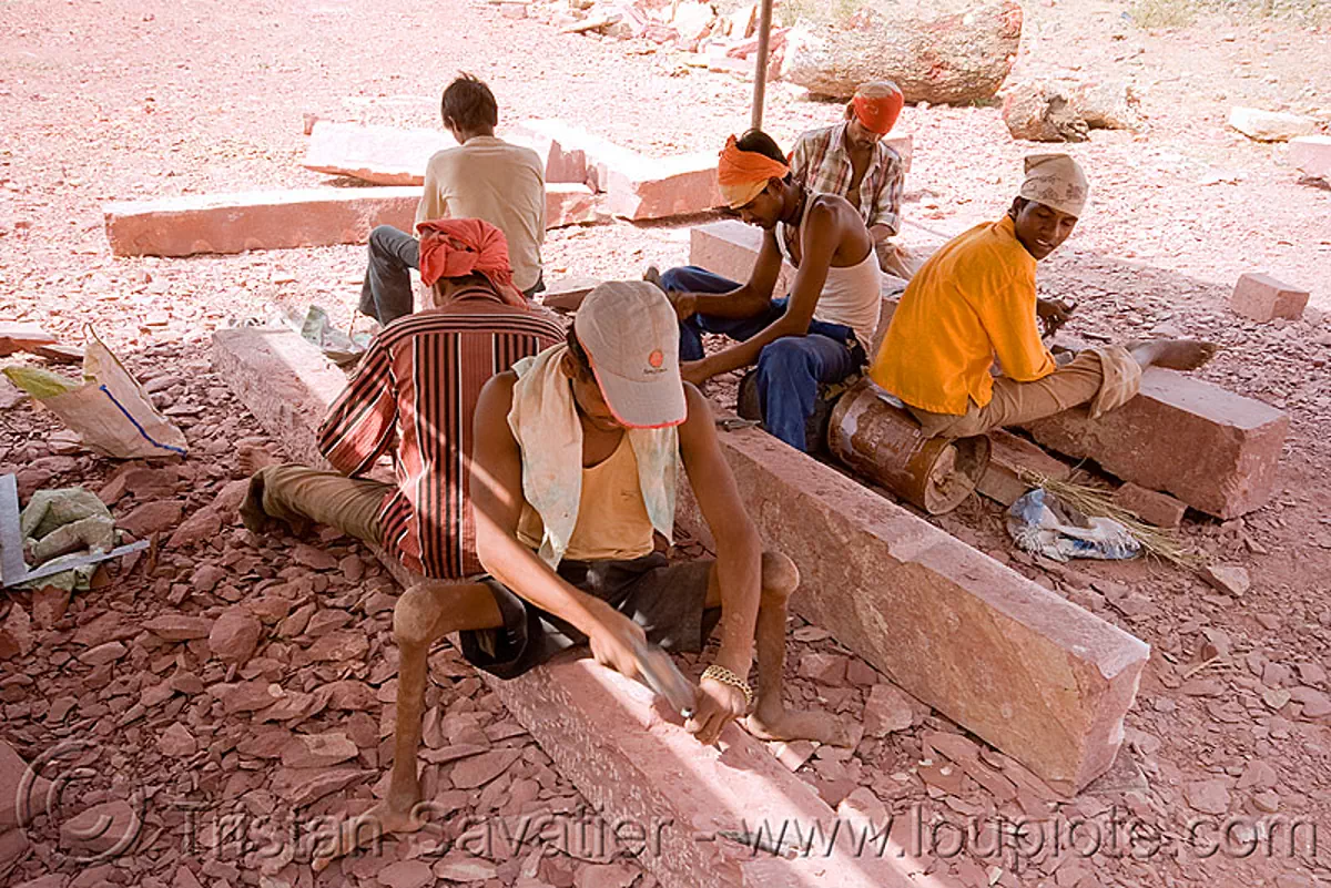 stonemasons at work, palace restoration, mandu, india