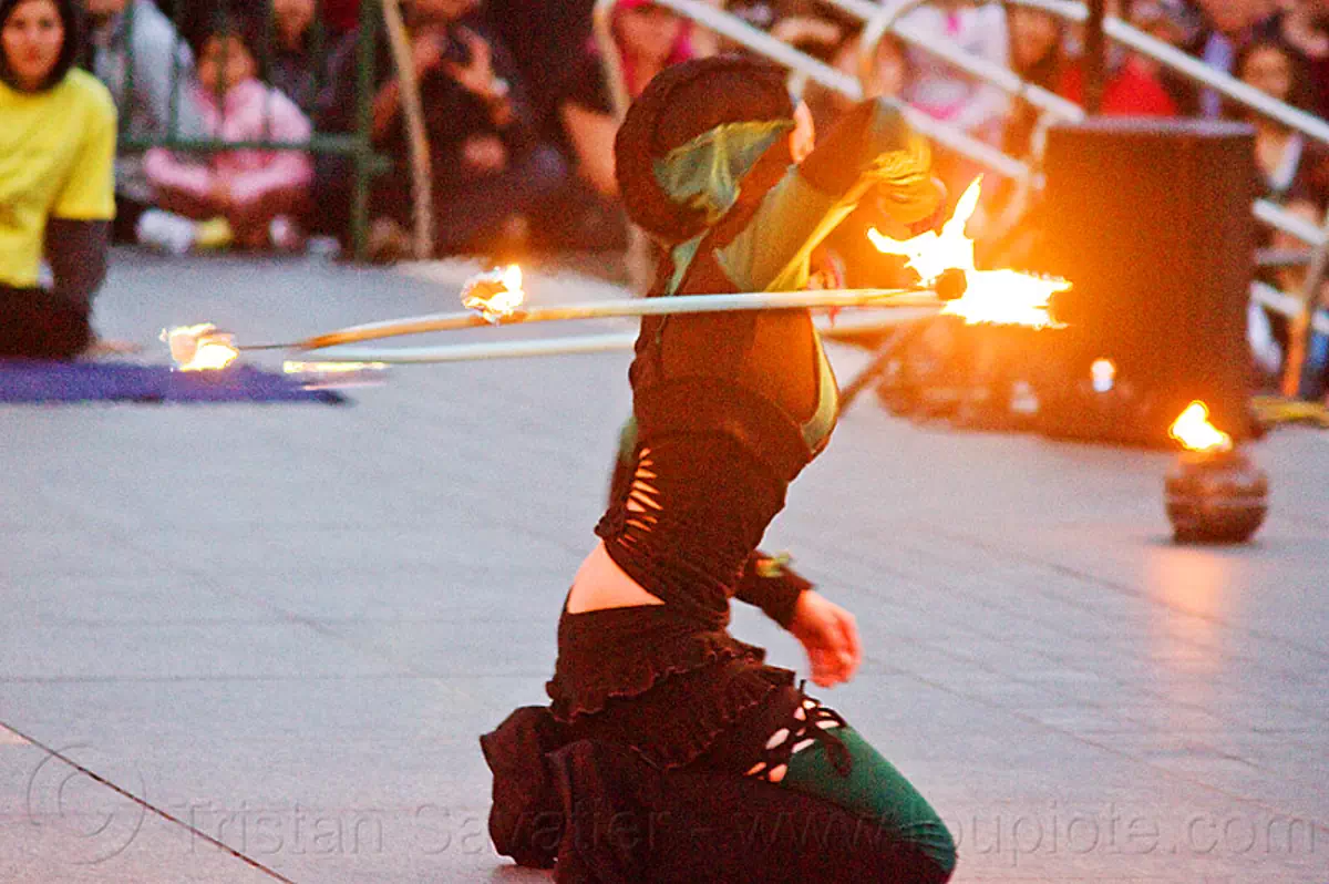 street performer with fire hoop
