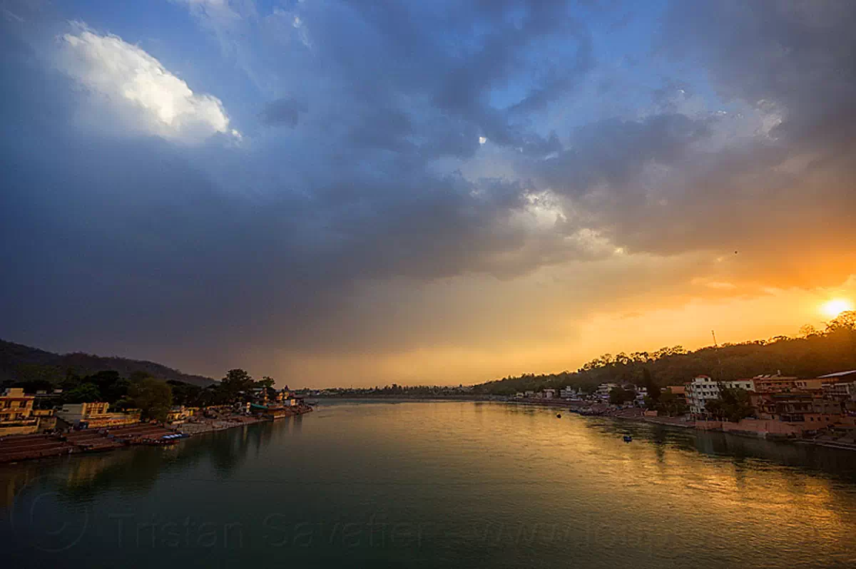 sunset sky over ganges river in rishikesh, india | Stock Photo #15645976567