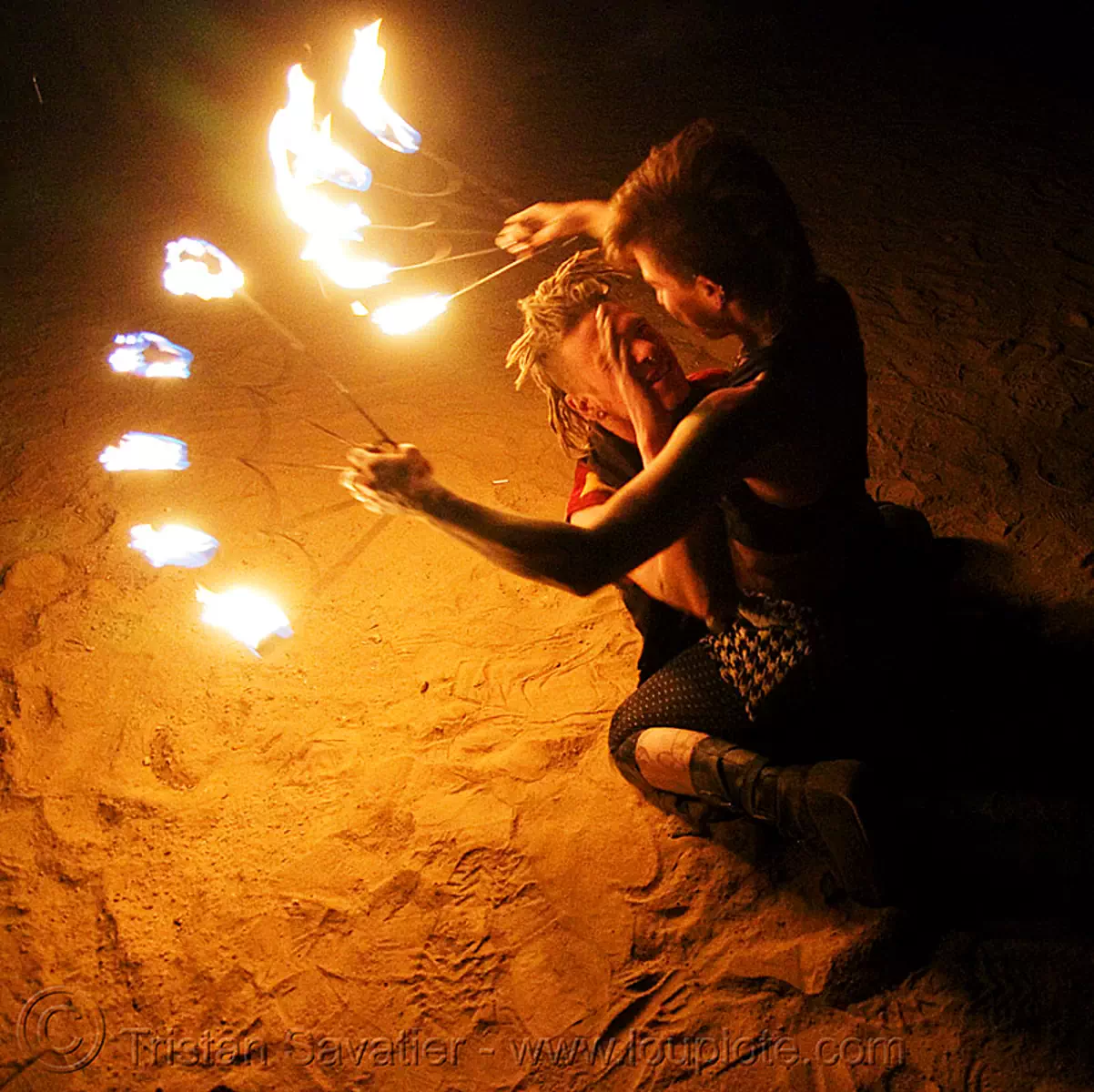 the fire of love, leah and ro with fire fans (san francisco), fire dancer