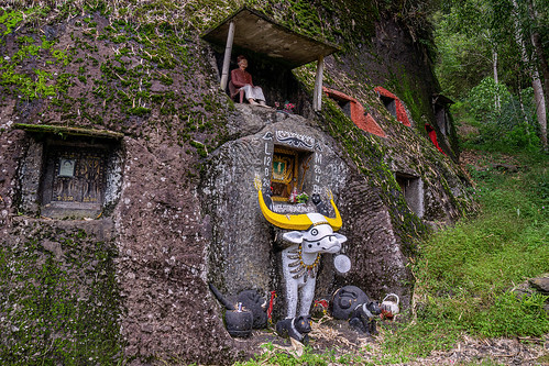 Toraja Rock-Tombs and Miniature Tongkonan Structures